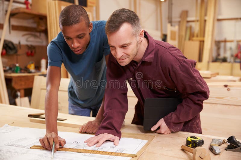 Black Men Carpenter Looking Plans Stock Photos - Free & Royalty-Free ...