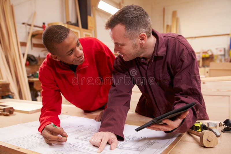 Black Men Carpenter Looking Plans Stock Photos - Free & Royalty-Free ...