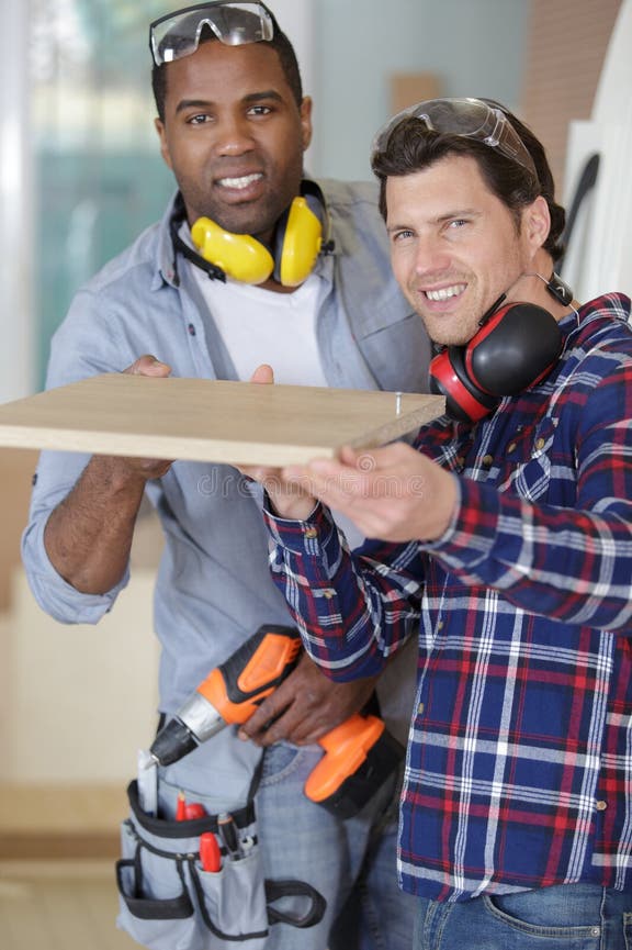 Carpenter with Apprentice in Training Period Stock Image - Image of ...