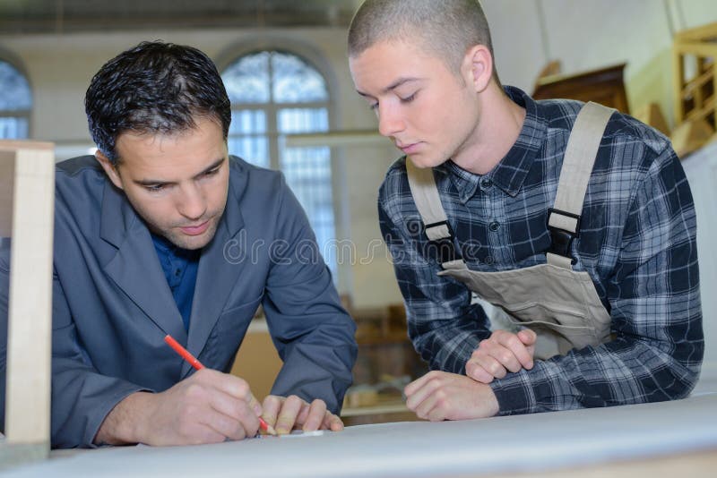Carpenter and Apprentice in Workshop Stock Image - Image of carpentry ...