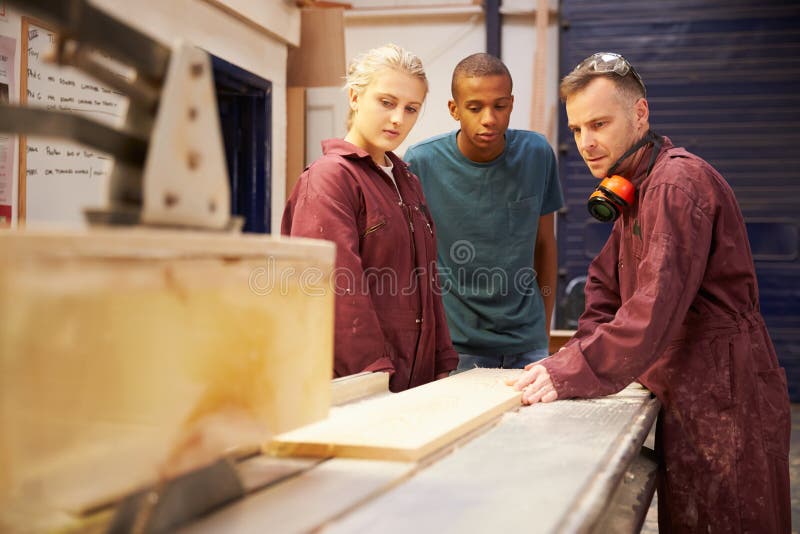 Apprentice Using Circular Saw in Carpentry Workshop Stock Image - Image ...
