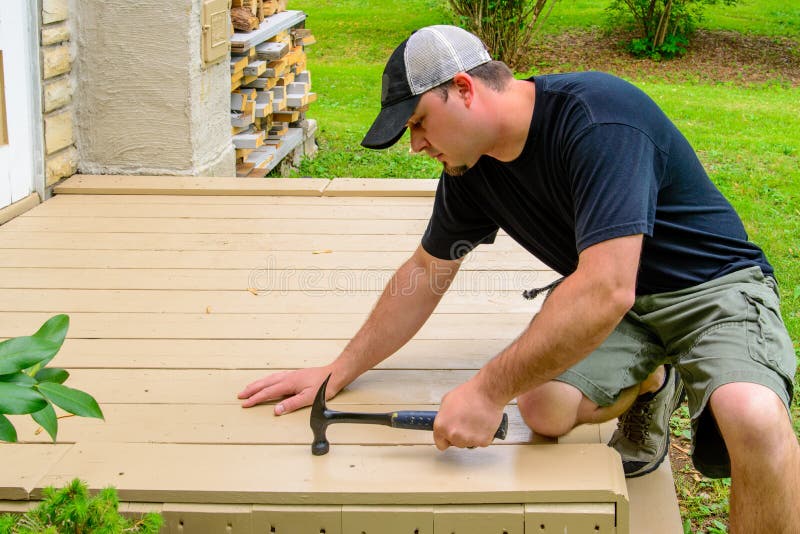 Carpenter Bulding Deck Swinging Hammer Stock Photo - Image of shirt ...