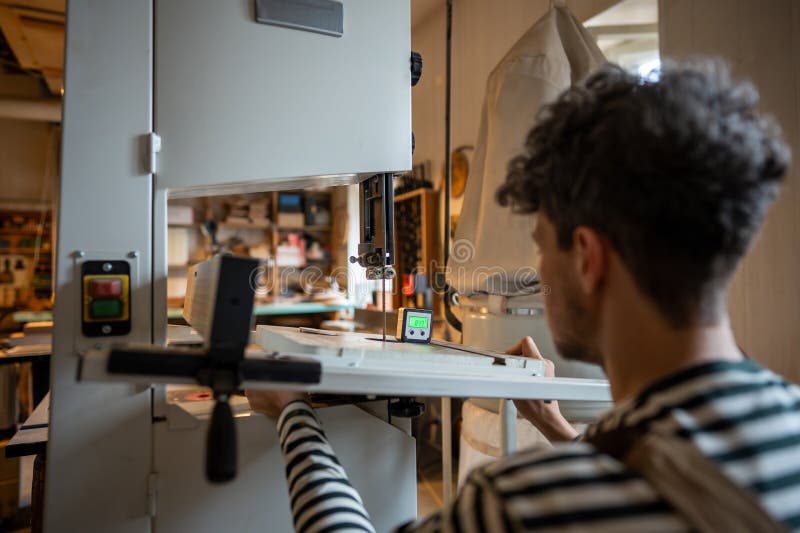Carpenter Calibrates Lathe for Work. Man Joiner Setting Right Level ...