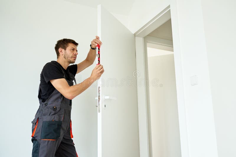 Carpenter Checking Door Alignment Stock Photos - Free & Royalty-Free ...