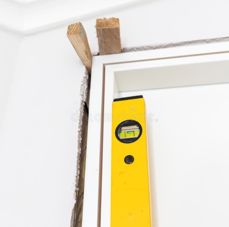 Carpenter Checking Door Alignment Spirit Level Stock Photos - Free ...