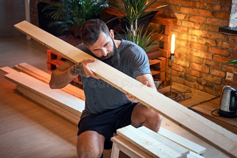 Carpenter Checks the Boards in a Loft Room. Stock Image - Image of ...