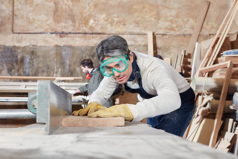 Carpenter Concentrated on Planing Machine Work Stock Image - Image of ...