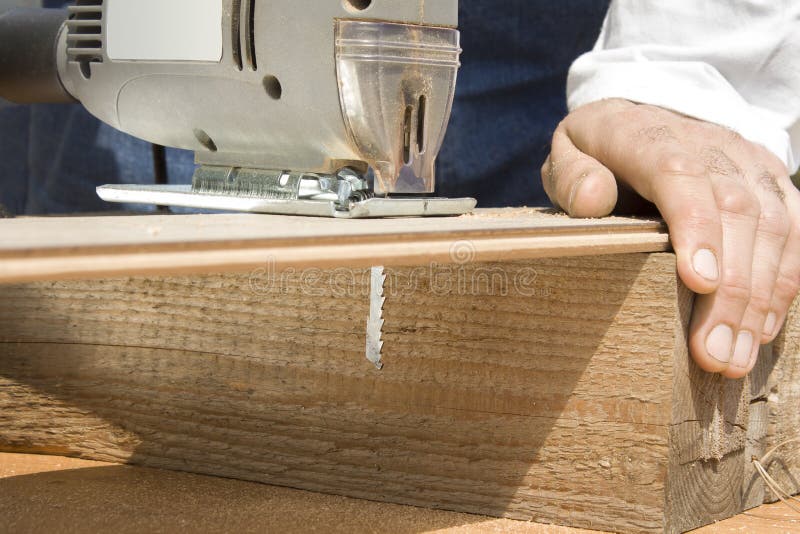 The Carpenter Crosses the Floor Panel with a Fretsaw. Stock Image ...