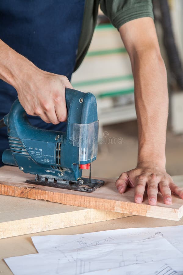 Carpenter Cut with a Machine Stock Photo - Image of caucasian ...