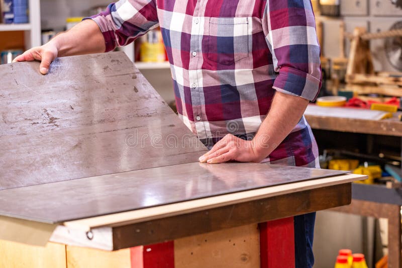 Carpenter Doing His Job in Carpentry Workshop. a Man in a Carpentry ...