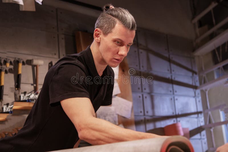 Carpenter Doing His Job in Carpentry Workshop. a Man in a Carpentry ...