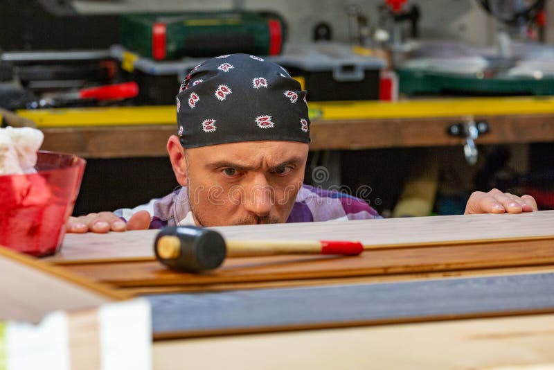 Carpenter Doing His Job in Carpentry Workshop. a Man in a Carpentry ...