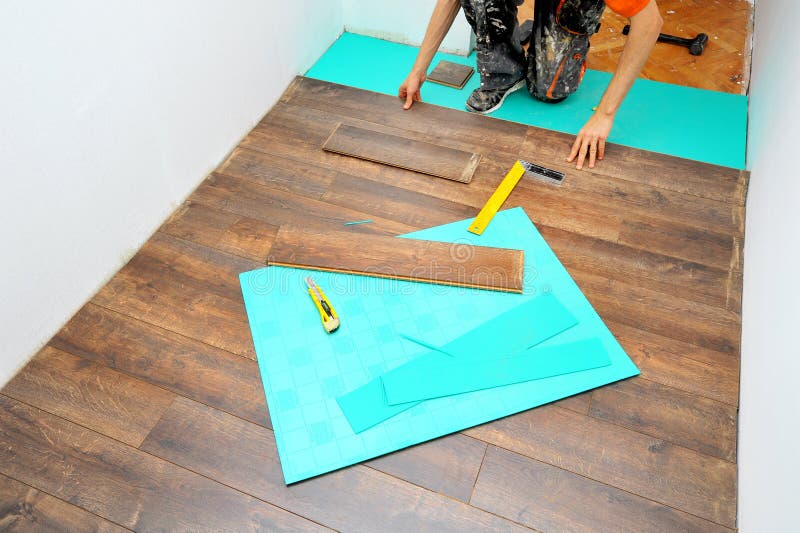 Carpenter Doing Laminate Floor Work Stock Photo - Image of layer ...