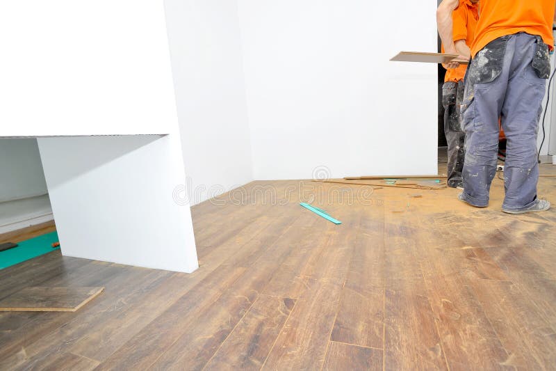 Carpenter Doing Laminate Floor Work Stock Photo - Image of floor ...