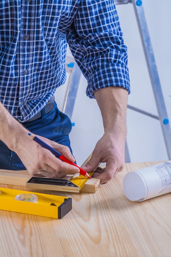 Carpenter Drawing on Wooden Plank Construction Stock Image - Image of ...