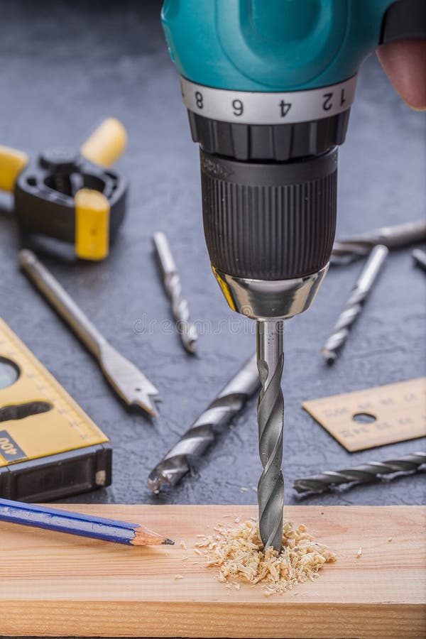 Carpenter Drilling Wood Using Portable Drilling Machine Stock Photo ...