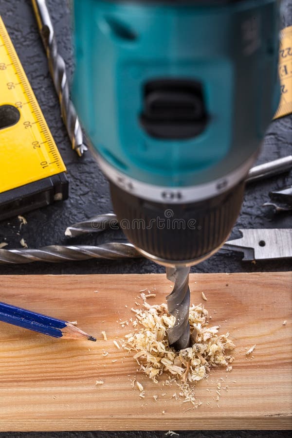 Carpenter Drilling Wood Using Portable Drilling Machine Stock Image ...