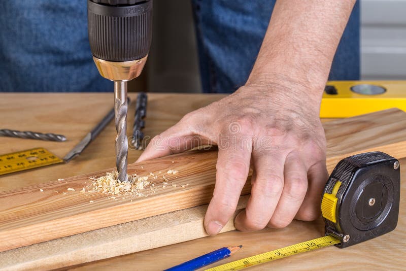 Carpenter Drilling Wood Using Portable Drilling Machine Stock Image ...