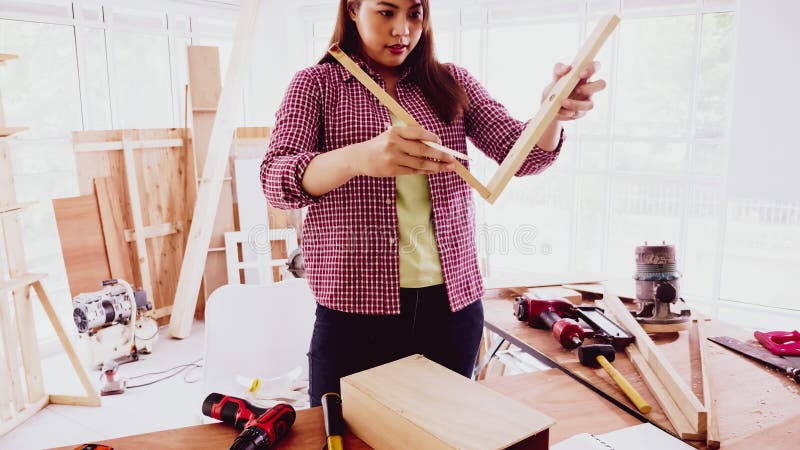 Carpenter Fitting Pieces of Boards Together at Site Stock Image - Image ...