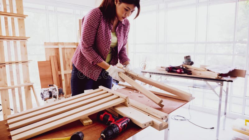 Carpenter Fitting Pieces of Boards Together at Site Stock Photo - Image ...