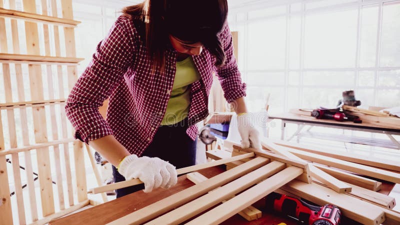 Carpenter Fitting Pieces of Boards Together at Site Stock Photo - Image ...