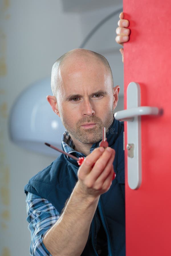 Carpenter Fixing Lock in Door with Screwdriver Stock Image - Image of ...