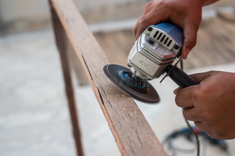 Carpenter Grinds the Wood of Angular Grinding Machine Stock Image ...