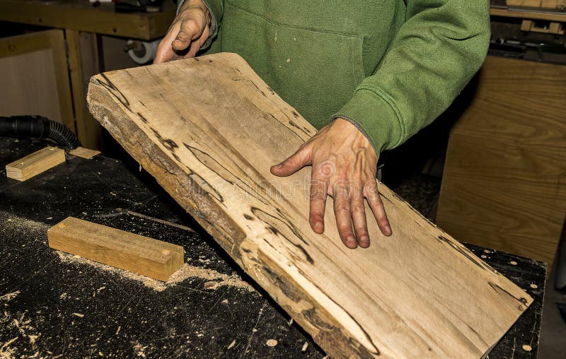 Carpenter Handling Wooden Plank on Carpentry Table Stock Image - Image ...