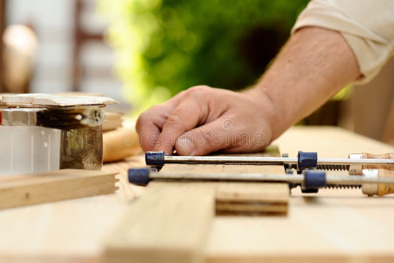 Carpenter Hands at Work with Clamp Stock Photo - Image of repair, pine ...