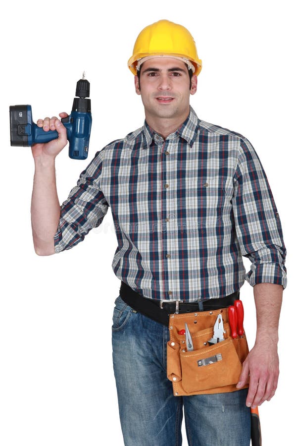 Carpenter holding drill stock photo. Image of adult, hand - 28641648
