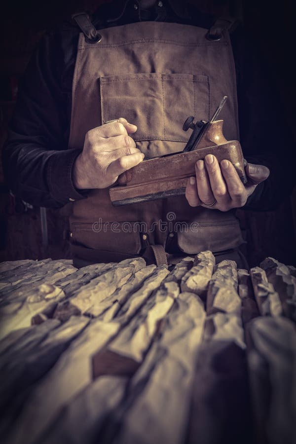 Carpenter holding a planer stock image. Image of craft - 272049791