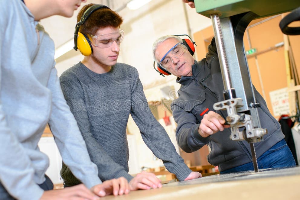 Carpenter Instructor with Students in Workshop Stock Image - Image of ...