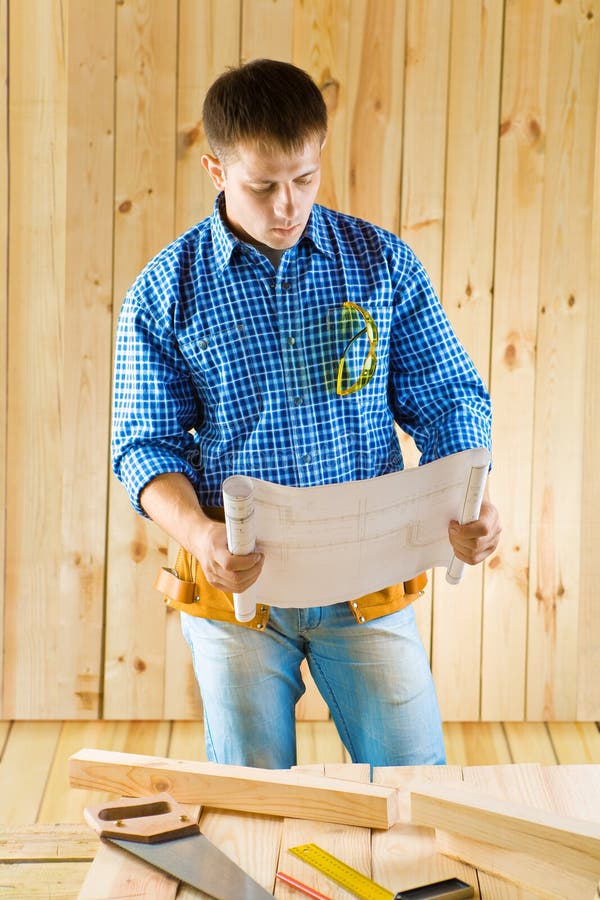 Carpenter Looks on Blueprint Stock Image - Image of foreman, goggles ...