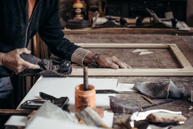 The Carpenter Makes Frames. Stock Photo - Image of joiner, construction ...