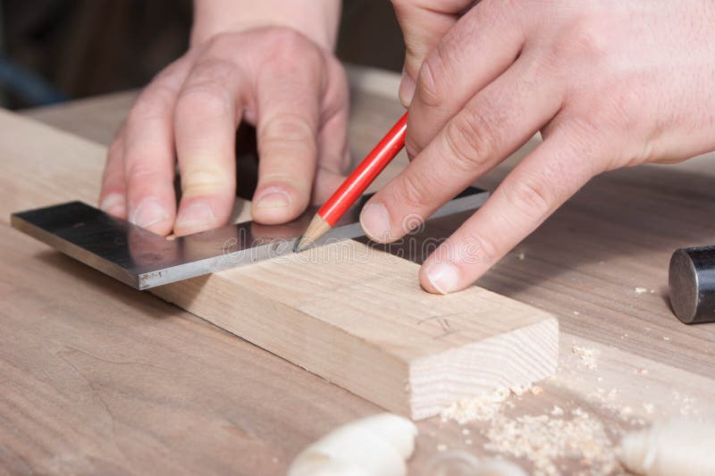 Carpenter Makes Pencil Marks on a Wood Plank Stock Photo - Image of ...