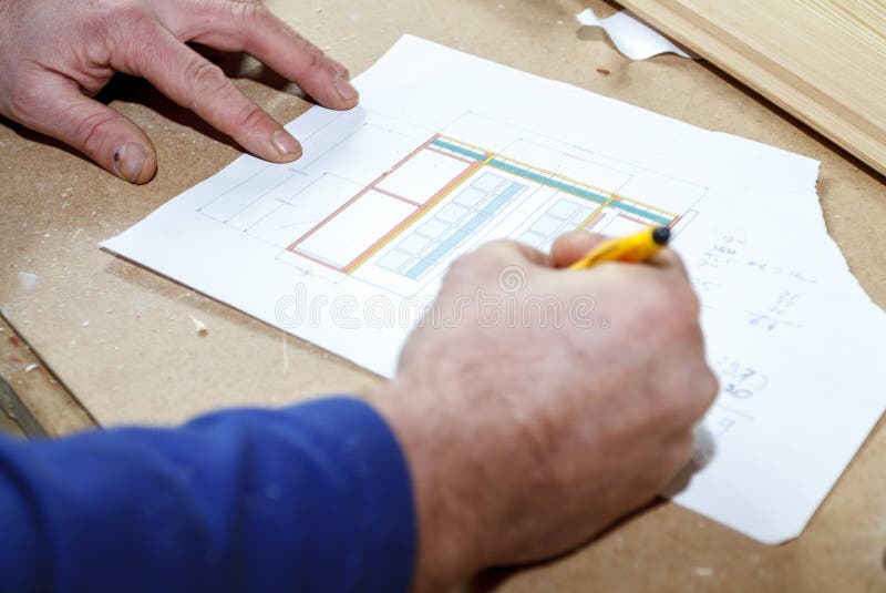 Carpenter making drawings stock image. Image of instructions - 83735969