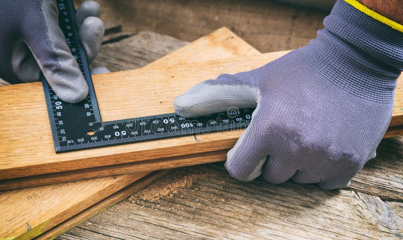 Carpenter Measuring with a Metal Angle Stock Image - Image of joiner ...