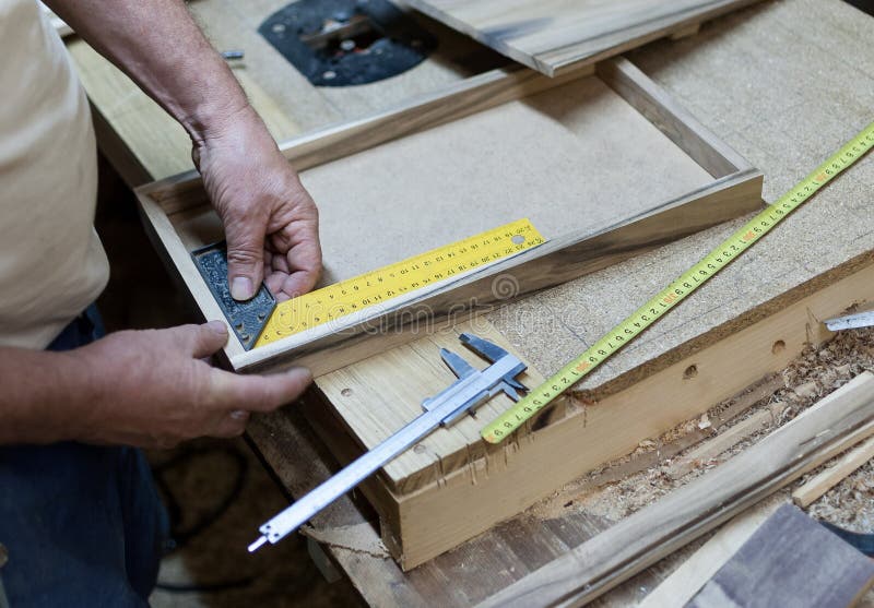 Carpenter is Measuring a Product with Ruler Stock Photo - Image of tool ...