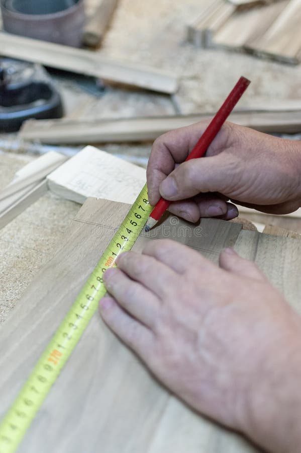 Carpenter Measuring a Product with Ruler Stock Image - Image of work ...