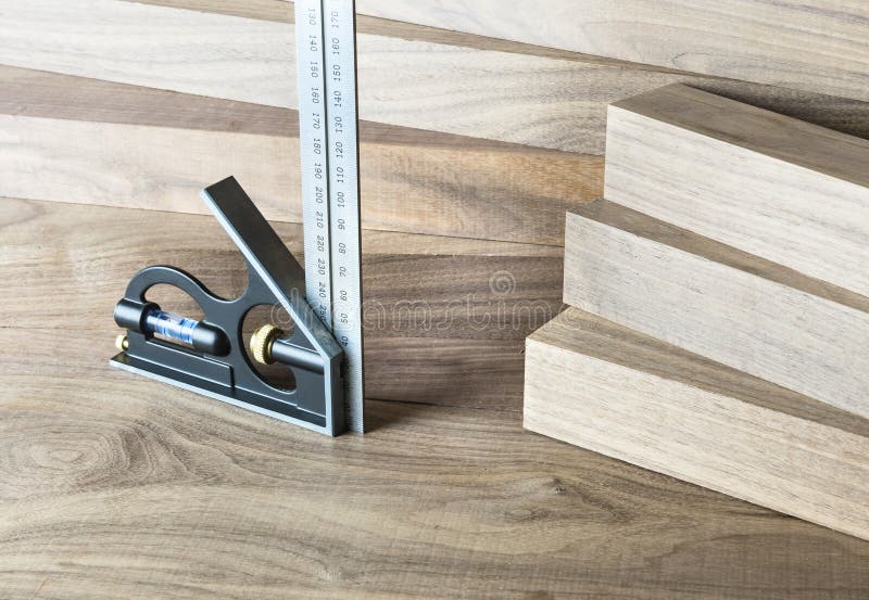 Carpenter measuring square stock image. Image of planks - 65068381