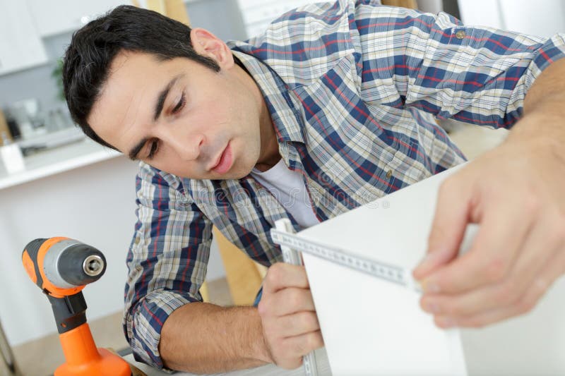 Carpenter Measuring on Wooden Table in Workshop Stock Photo - Image of ...