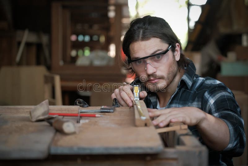 Carpenter Men Work on the Measurements of Wood in Carpentry Shop Stock ...