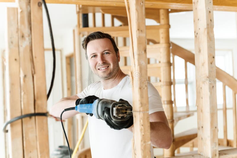 Carpenter Men Working in an Old House Stock Photo - Image of holding ...