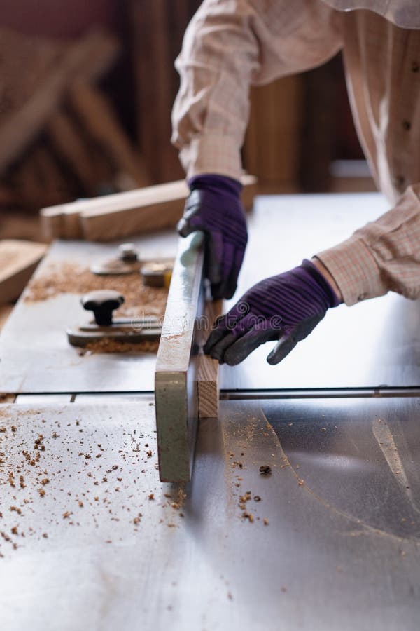 Carpenter Operating a Thickness Planer Machine in the Carpentry ...