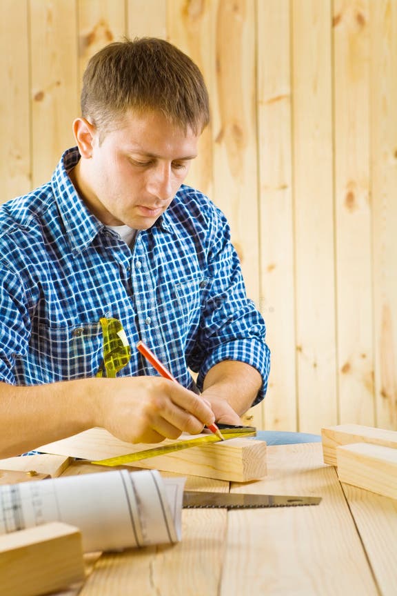 Carpenter with pencil stock photo. Image of plank, home - 25829162