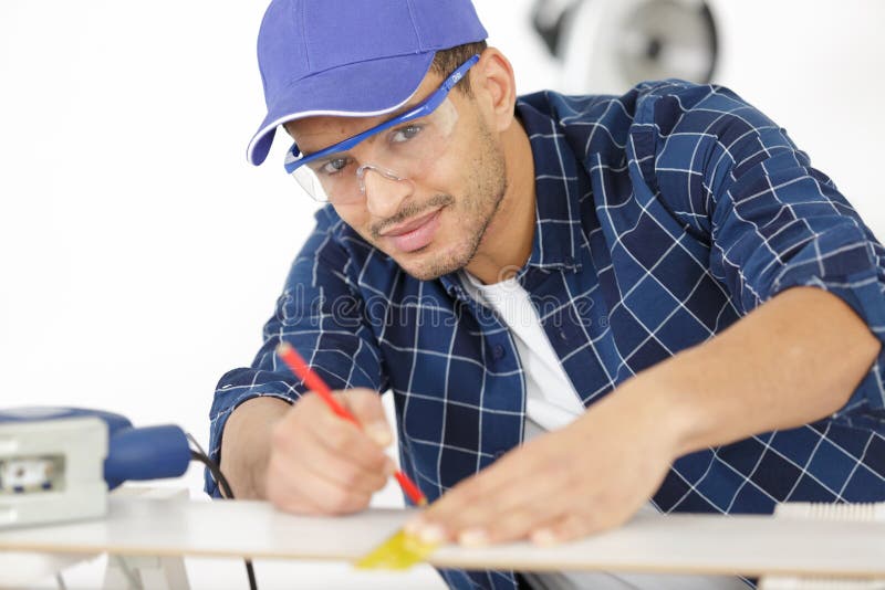 Carpenter with Pencil Drawing Project on Piece Wood Stock Photo - Image ...