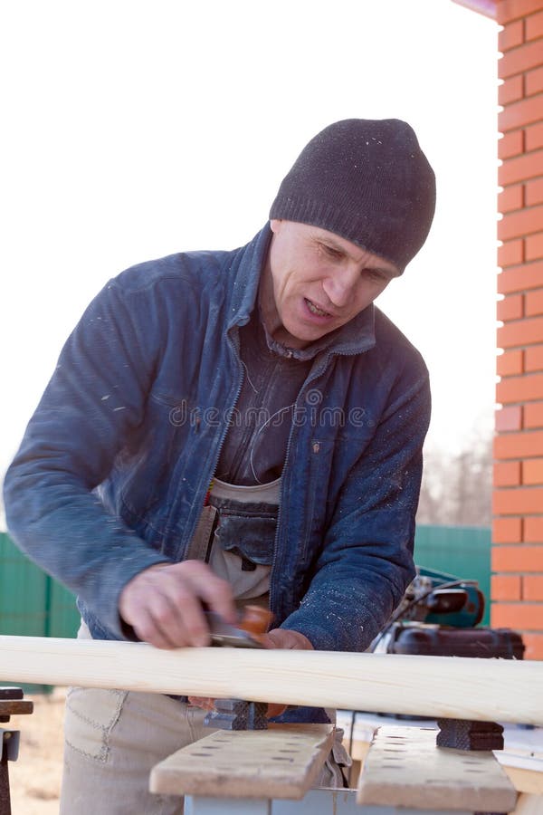 Carpenter with Plane Outdoor Stock Photo - Image of wooden ...
