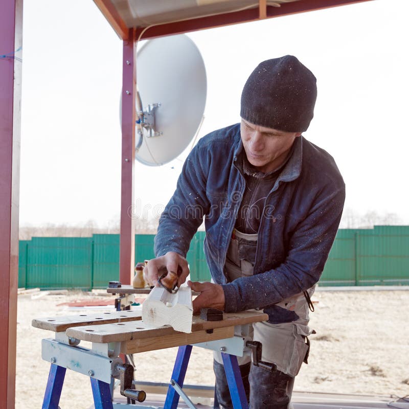 Carpenter with Plane Outdoor Stock Photo - Image of construction ...