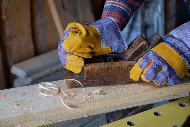 Carpenter planing board stock photo. Image of closeup - 40292772