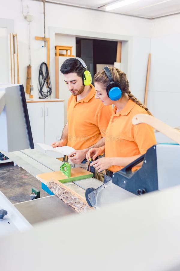 Carpenter Programming Computer Controlled Saw Stock Image - Image of ...
